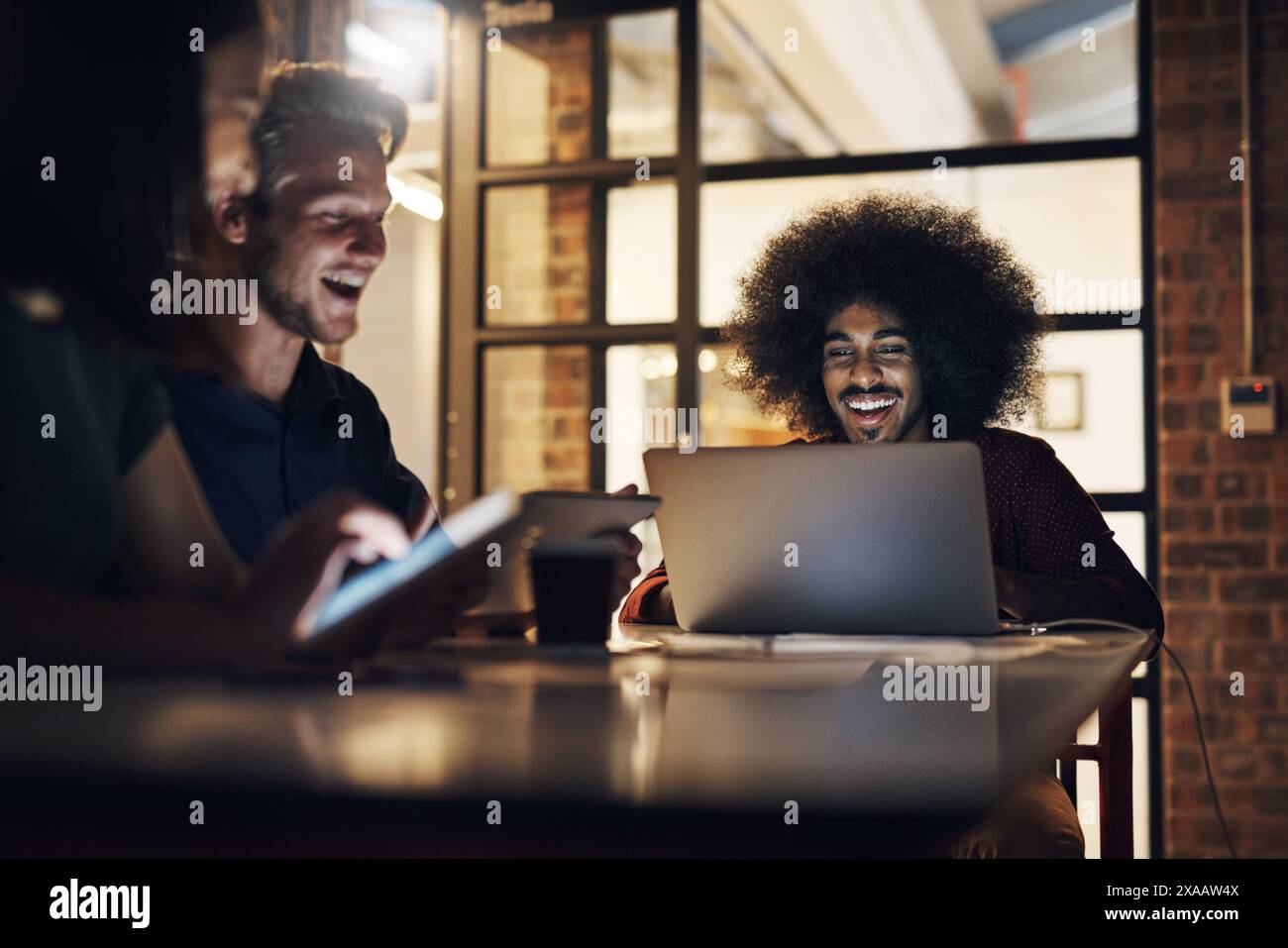 Employees, collaboration and dark in office, online and laptop in ...