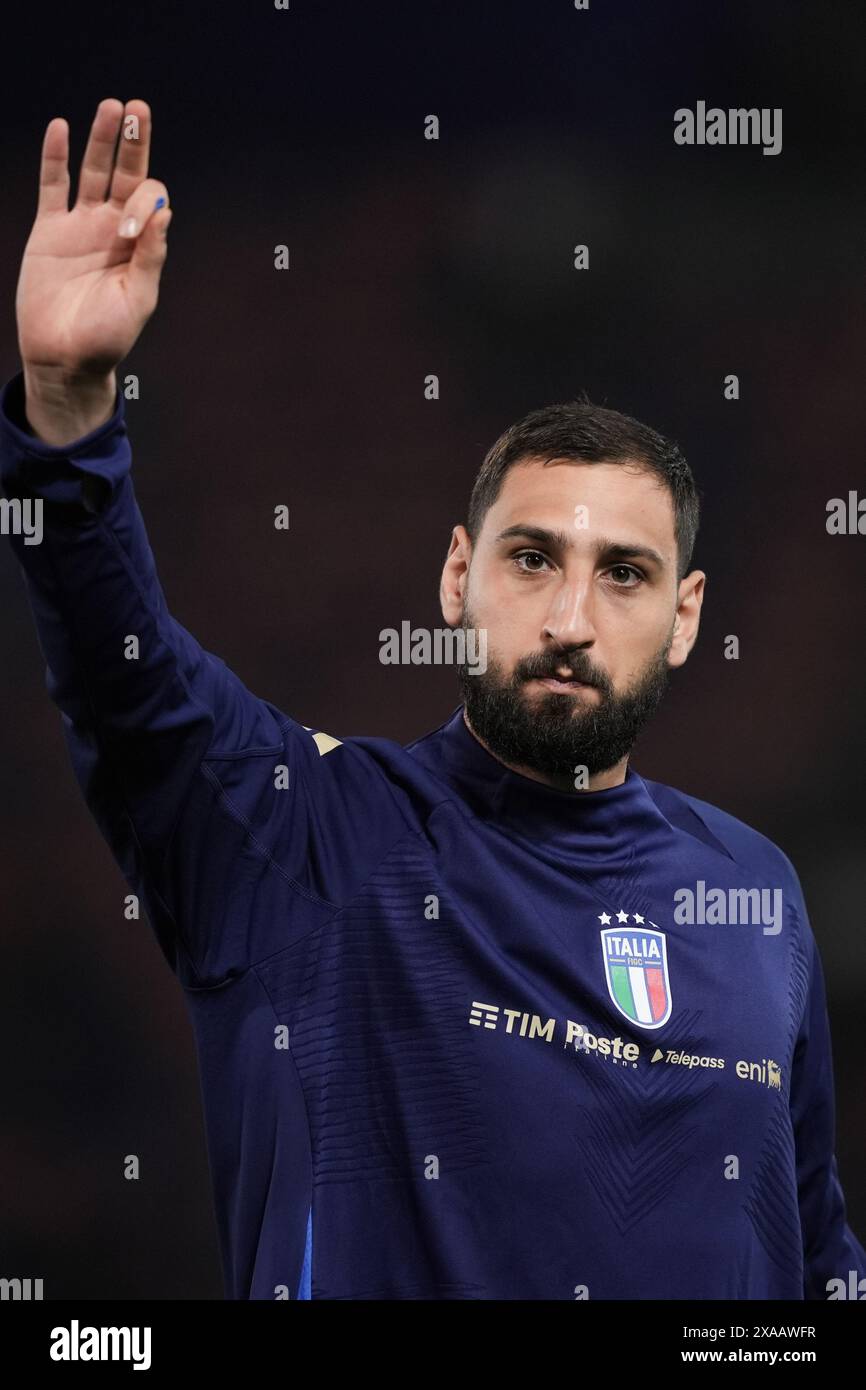 Italy's goalkeeper Gianluigi Donnarumma greets the fans during the ...