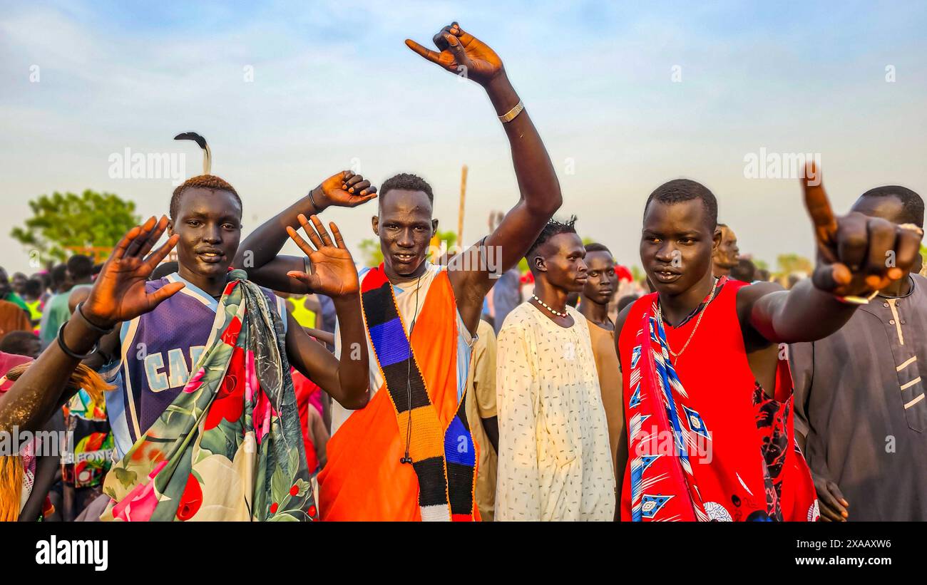 Locals dancing at a traditional Dinka wedding, Bor, central region ...