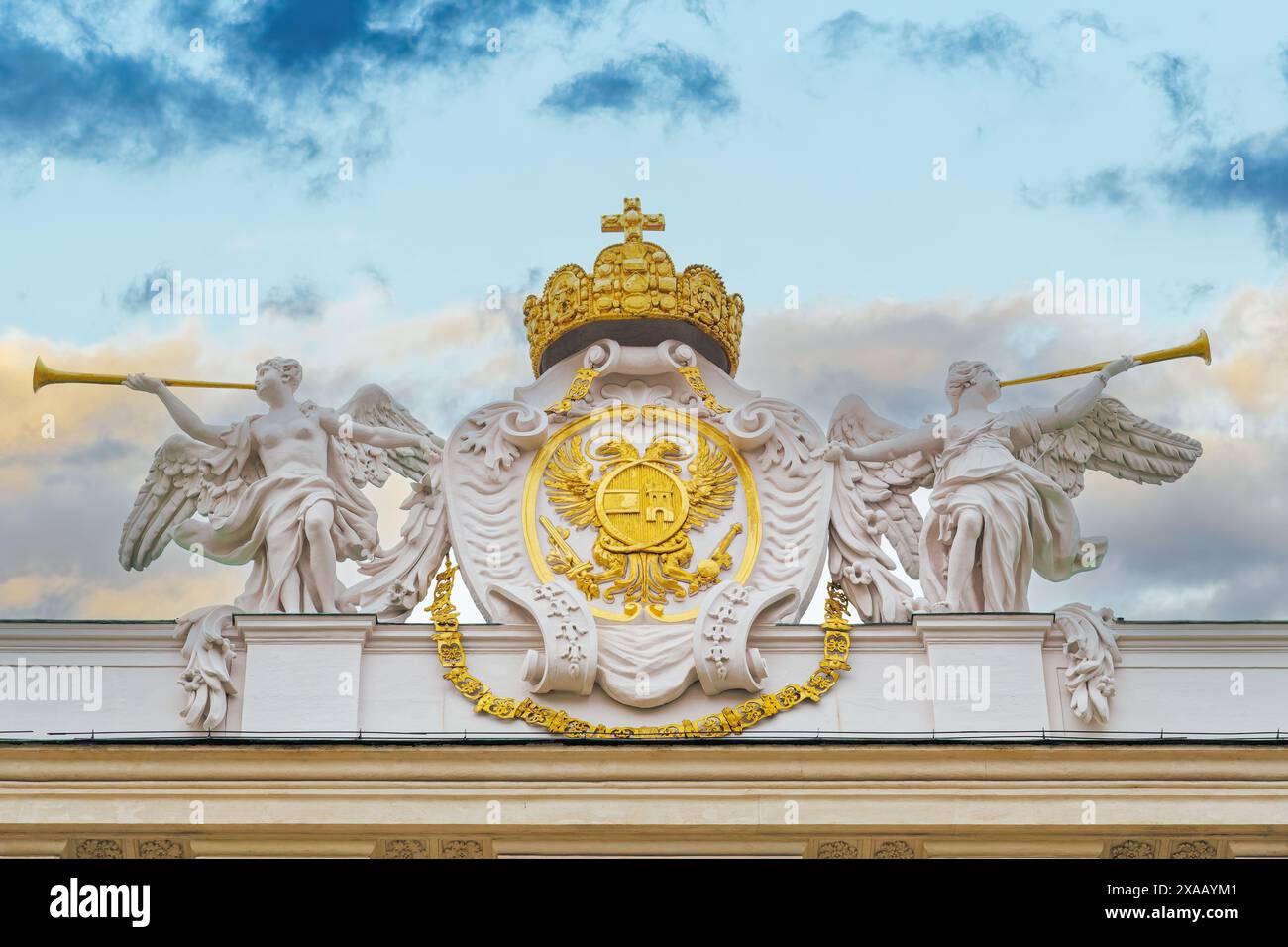 Habsburg coat of arms emblem with sculptures on the roof of Hofburg ...