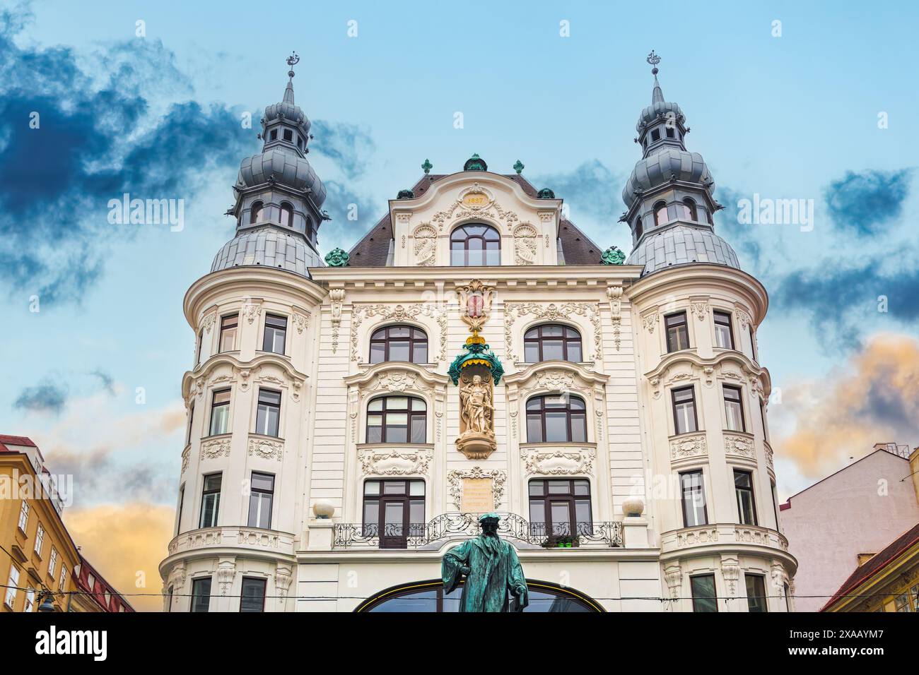 1897 Regensburger Hof building at Lugeck square with a statue of ...
