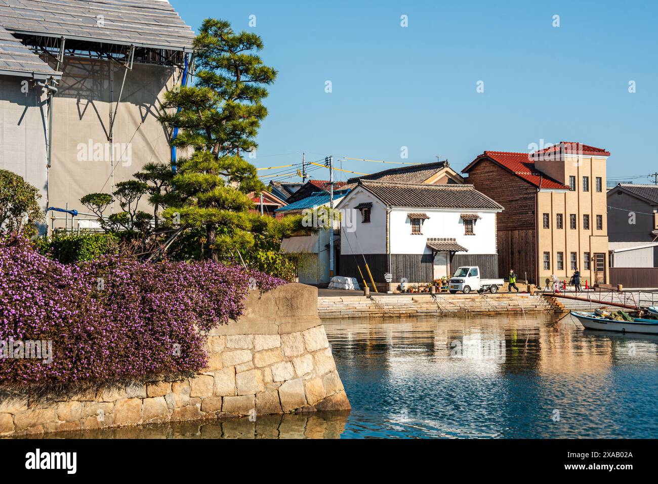 Port with houses in Tomonoura, a traditional Japanese fishing village ...