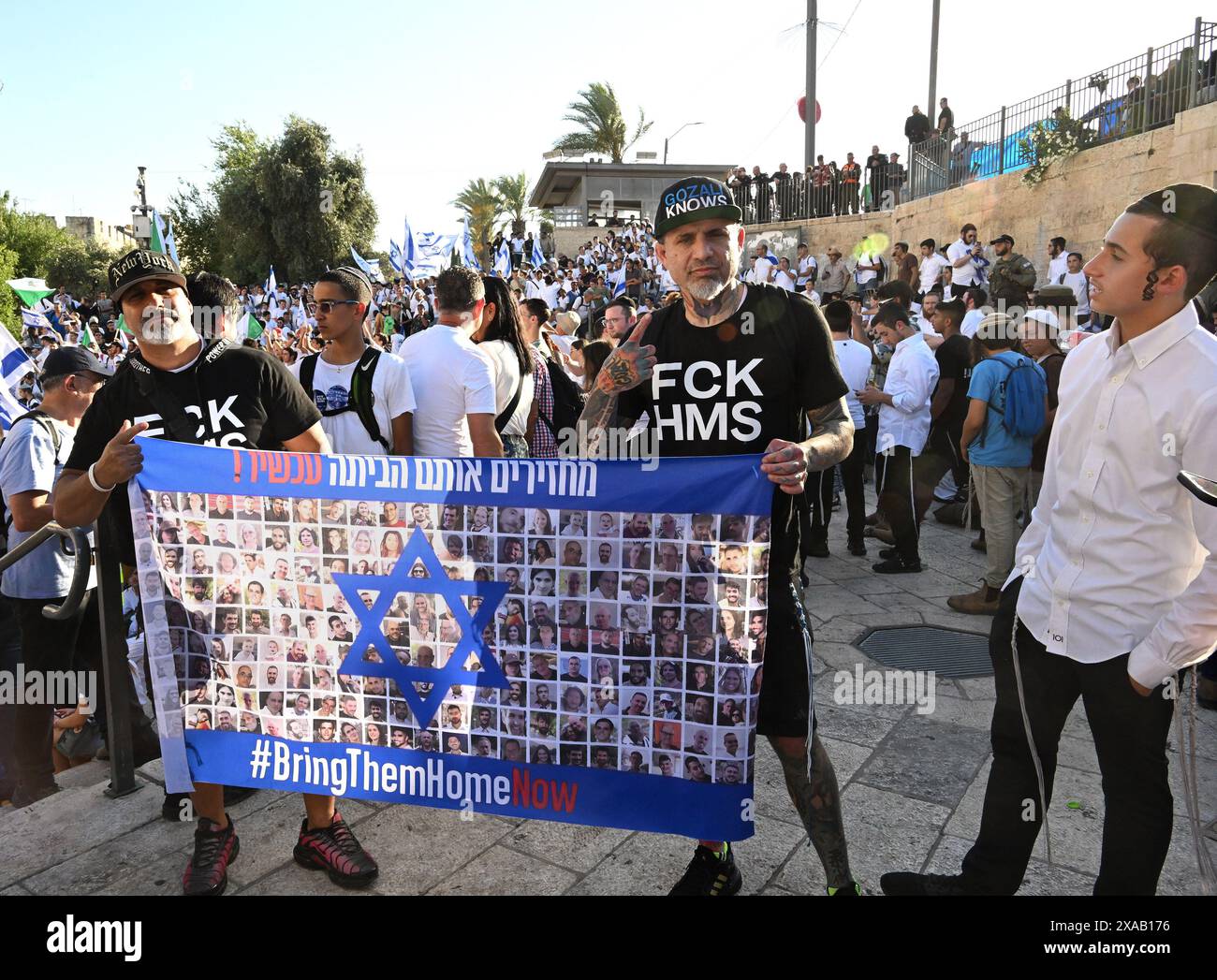 Jerusalem, Israel. 05th June, 2024. Israelis hold a flag with photos of ...