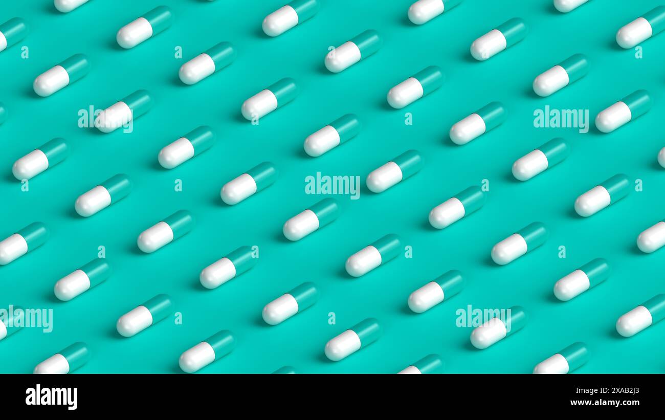 Many white turquoise capsules on turquoise background, tablet grid ...