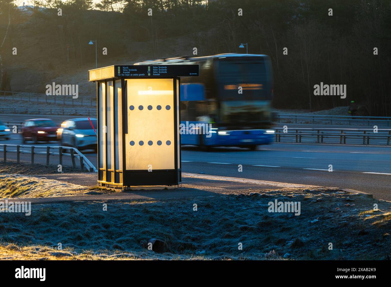 Gothenburg, Sweden - March 08 2024: Empty bus stop in golden sunrise ...