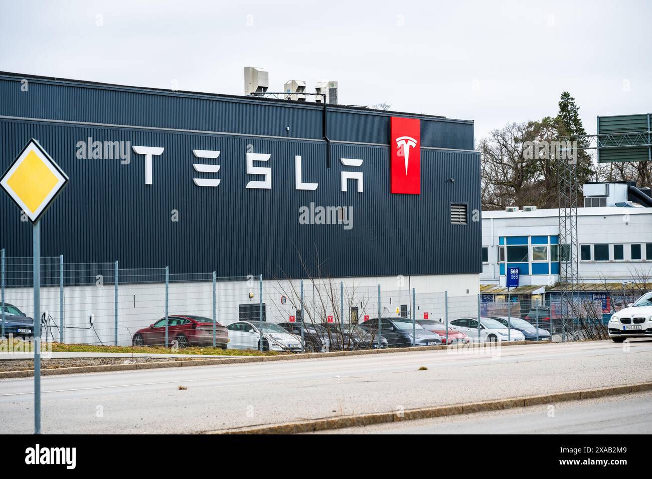 Stockholm, Sweden - March 09 2024: Tesla logo on the facade of a large ...