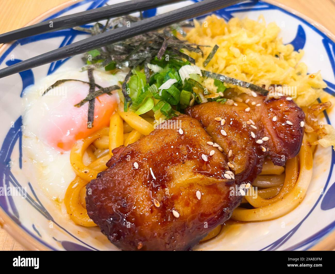 Udon, Beef Udon or Niku Udon is Udon Noodles in Hot Soup, with sliced ...