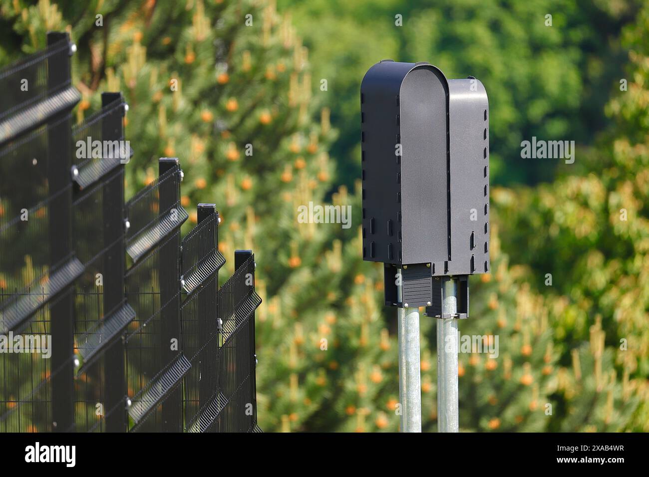 2 pole mounted Bat boxes in an industrial area of Leeds Stock Photo - Alamy