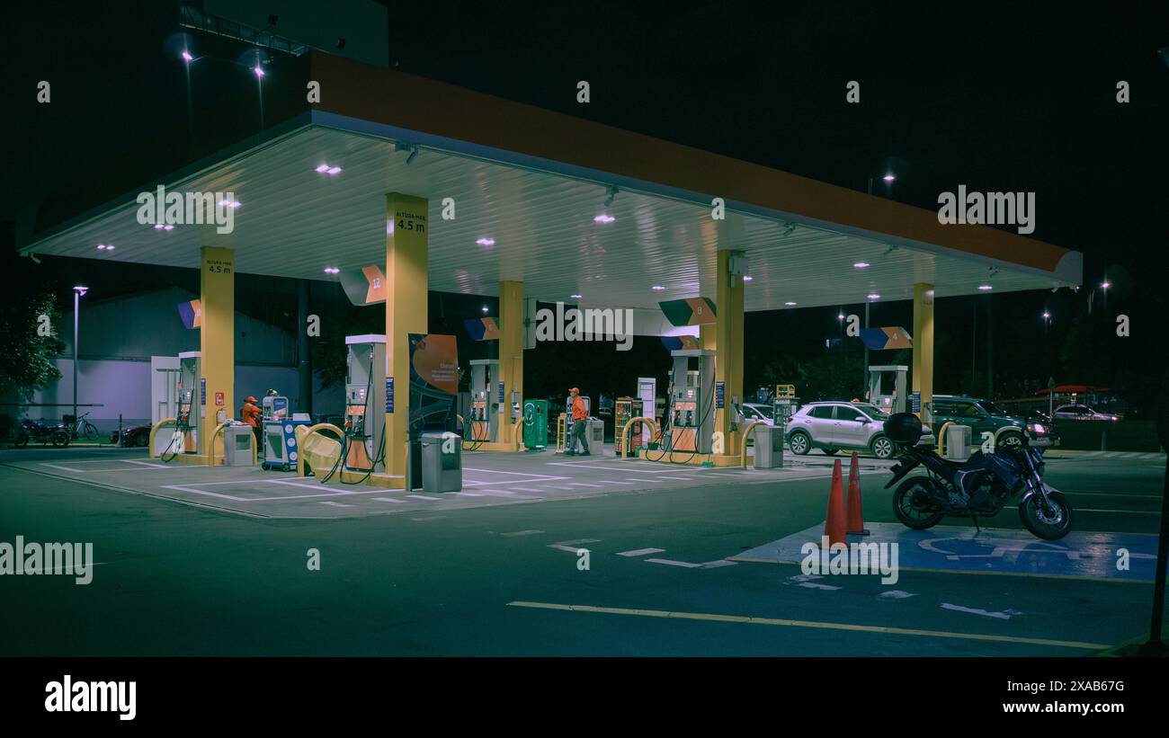 Gas station at night Stock Photo - Alamy