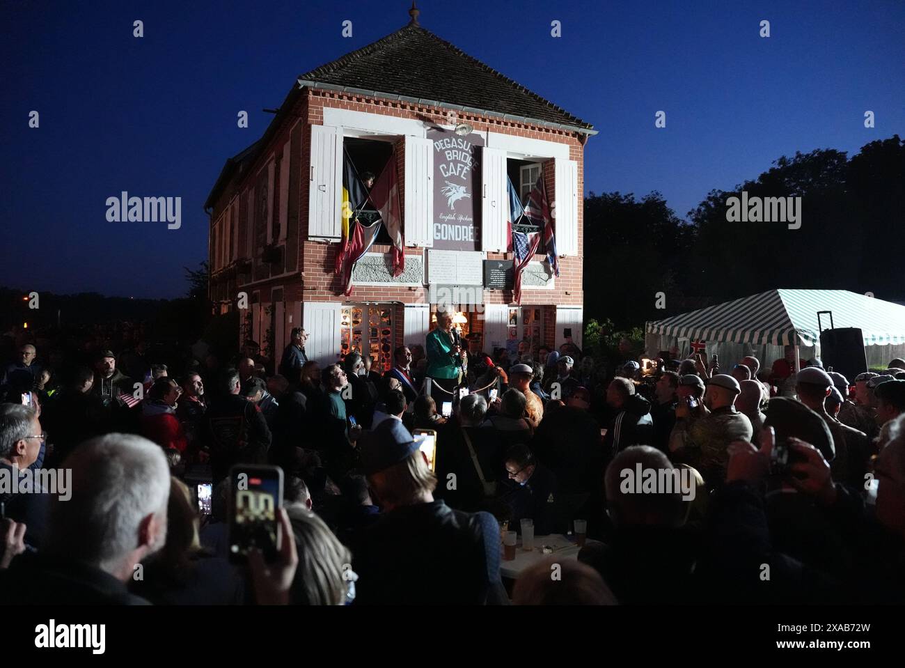 84-year-old Arlette Gondree speaking outside Cafe Gondree, near Pegasus ...