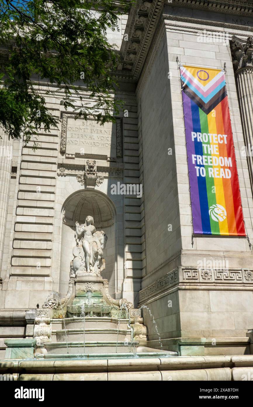 Lion in front of the New York Public Library with a Pride banner in the ...