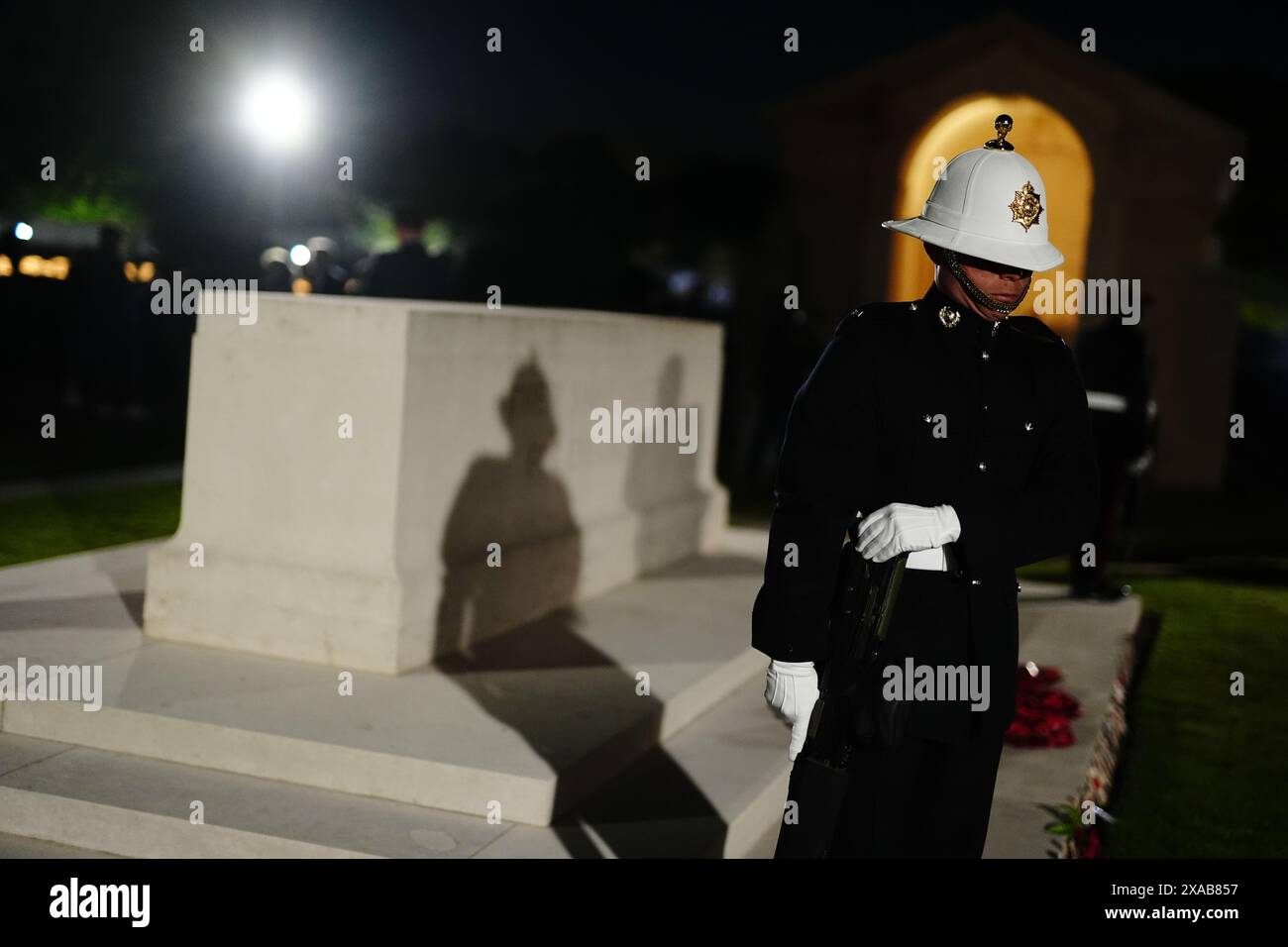 Members of the military stand vigil at the Stone of Remembrance during ...