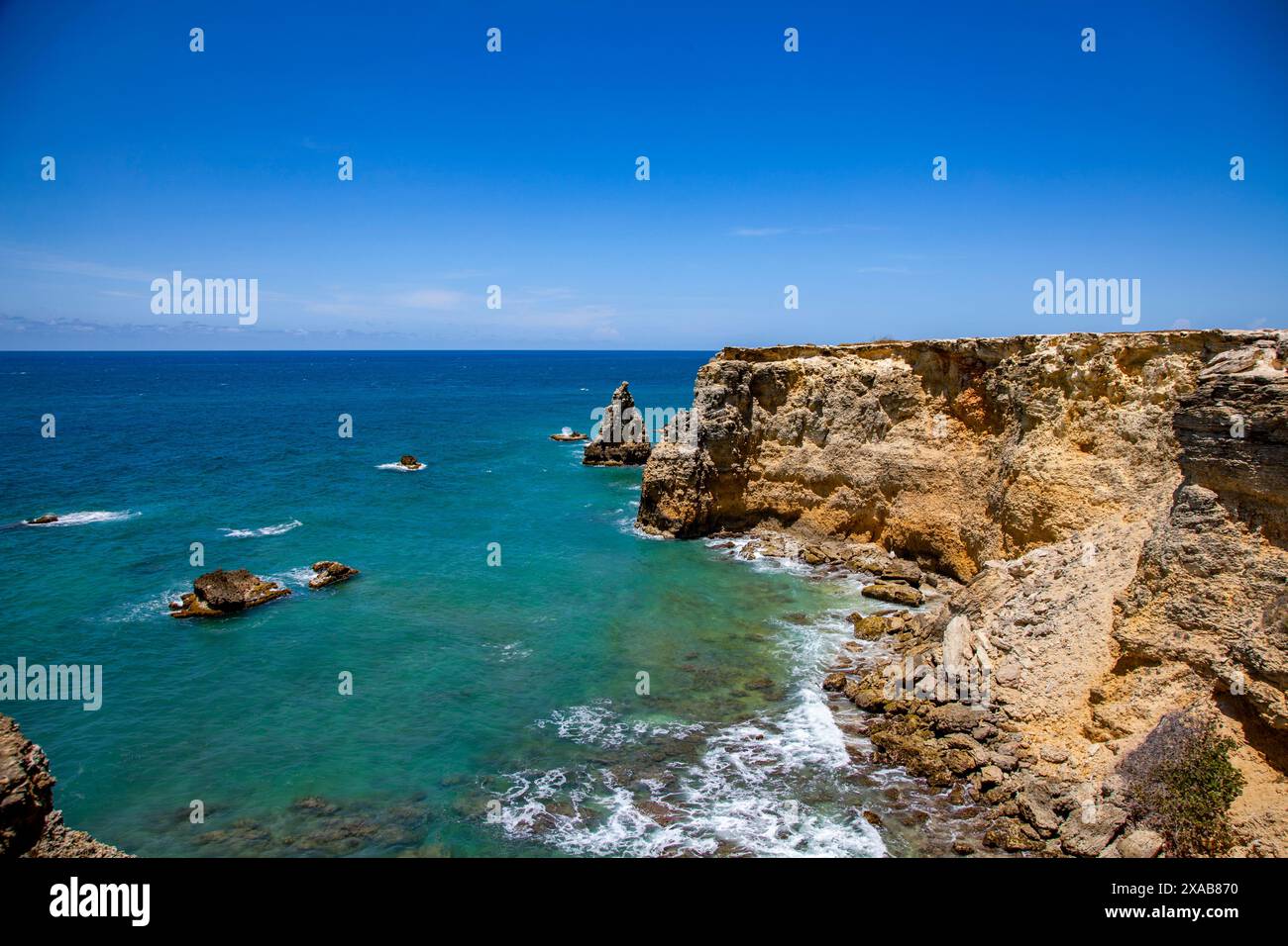 Cabo Rojo's rocky shoreline in Puerto Rico's aqua blue crystal clear ...