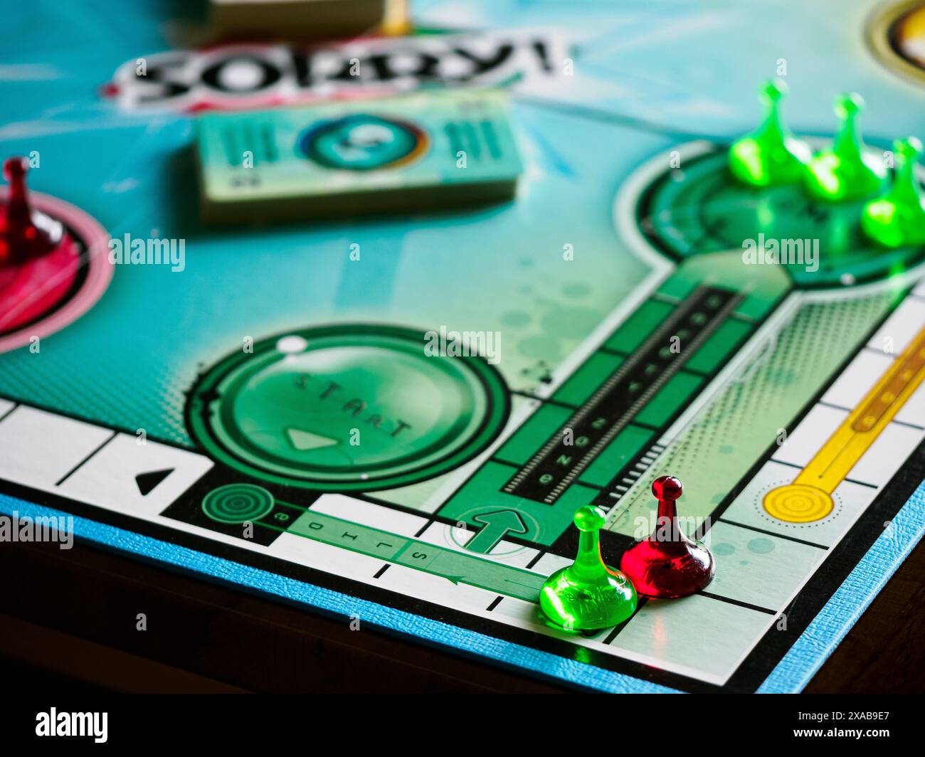 Sorry! board game showing final green player being sent back to start ...