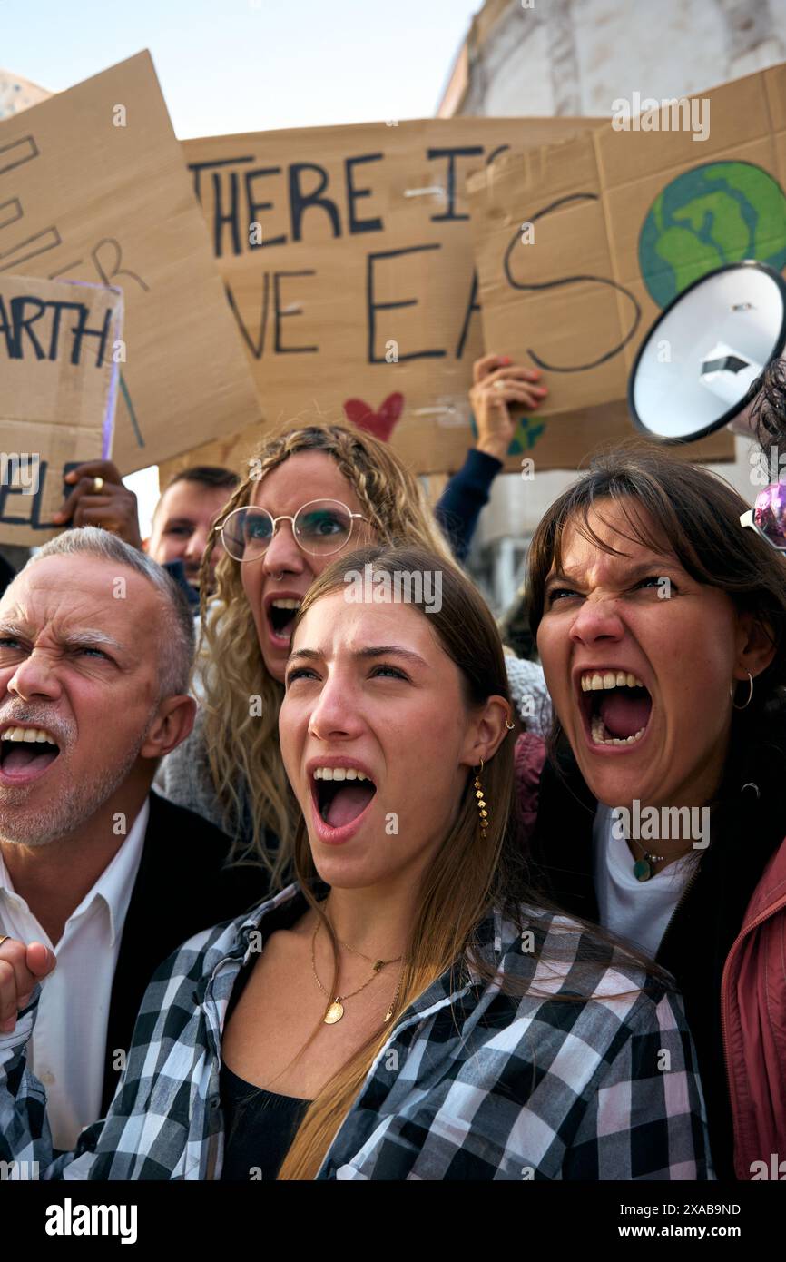 Group diverse people shouting angry outdoor manifesting for global ...