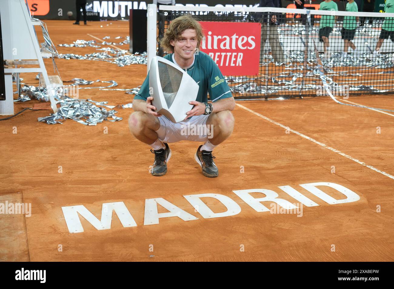 Andrey Rublev poses with the Mutua Madrid Open trophy following victory in the Men's Singles ...