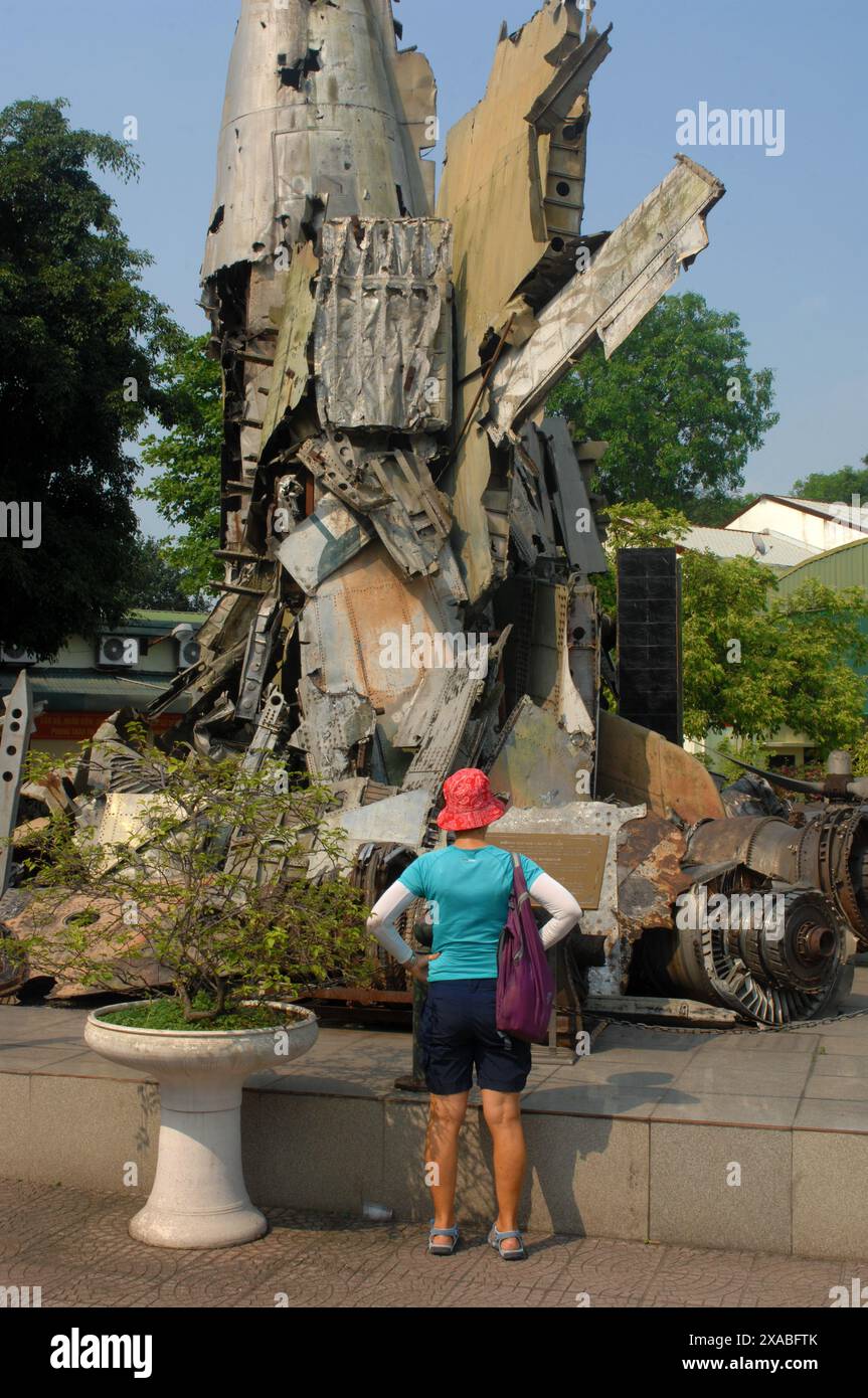 Tourists visiting the smashed American combat aircraft constructed as a ...