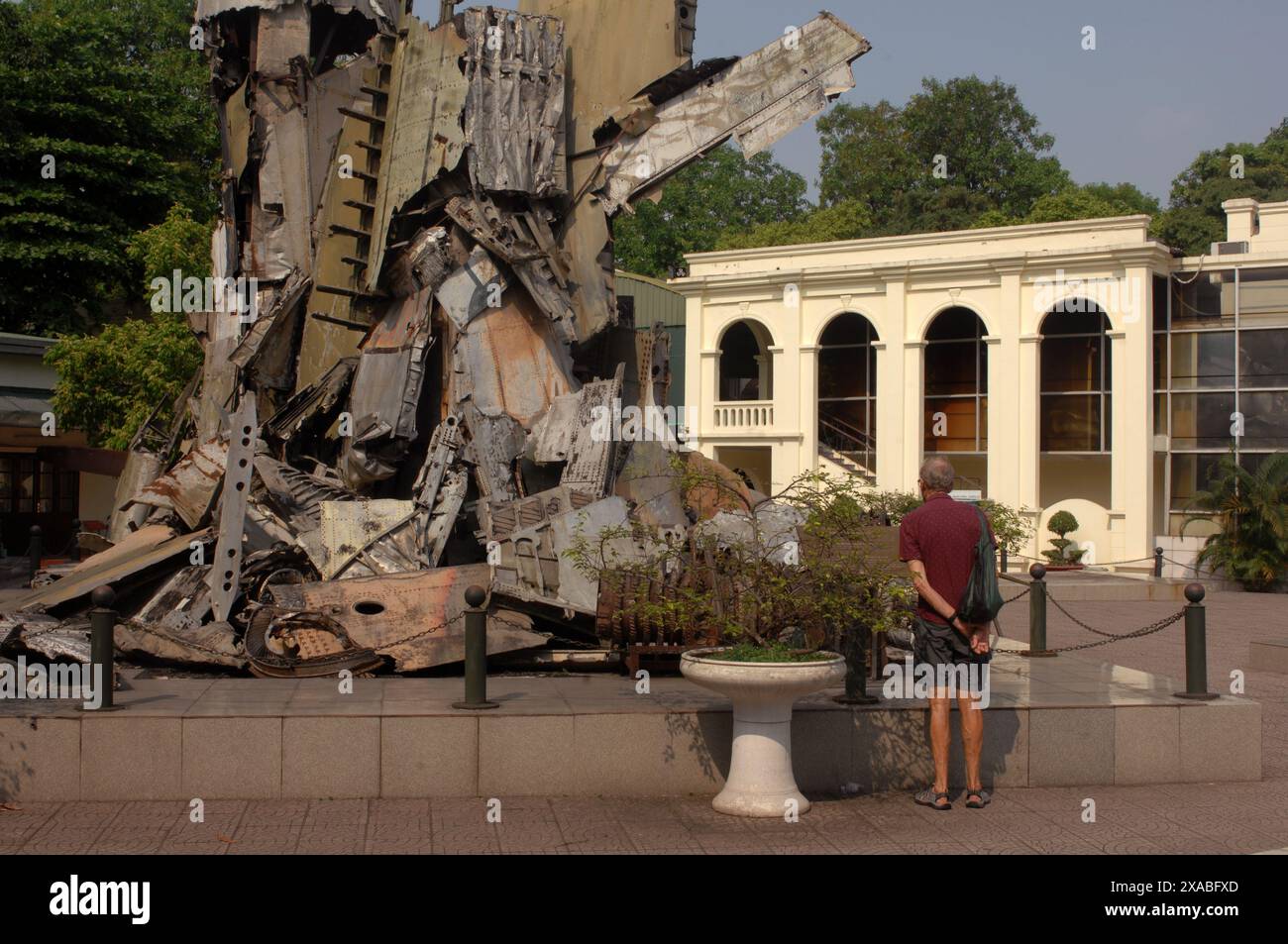 Tourists visiting the smashed American combat aircraft constructed as a ...