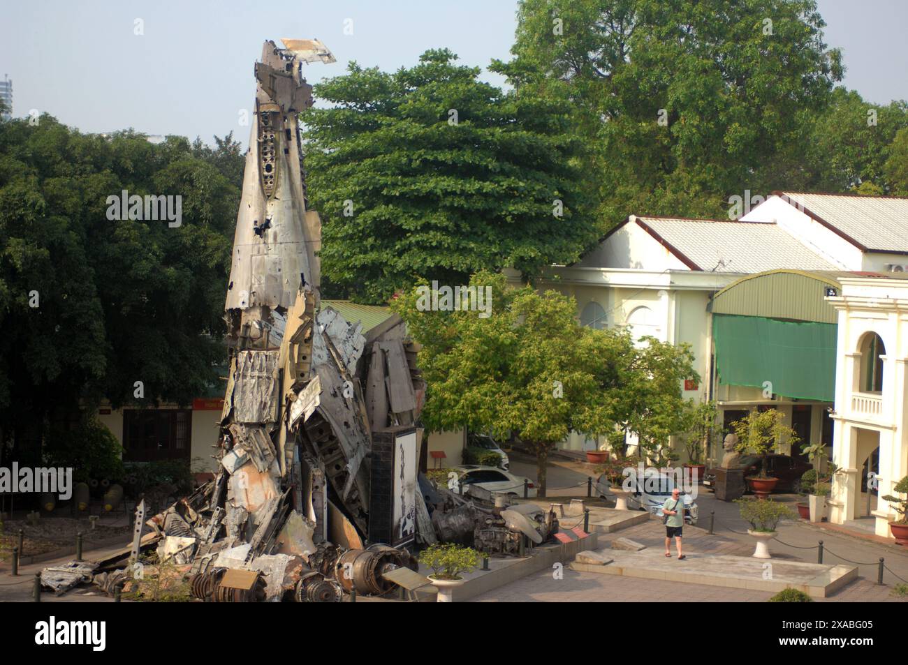 Tourists visiting the smashed American combat aircraft constructed as a ...