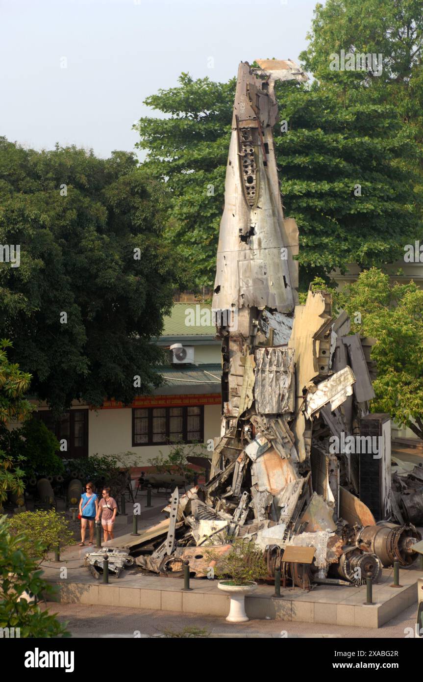 Tourists visiting the smashed American combat aircraft constructed as a ...
