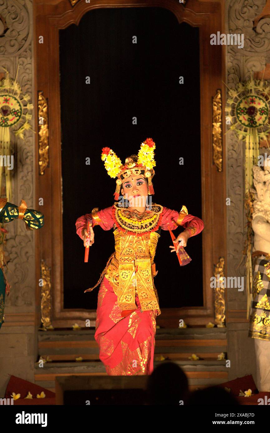 Traditional Balinese legong dance performer during a show at the Royal ...
