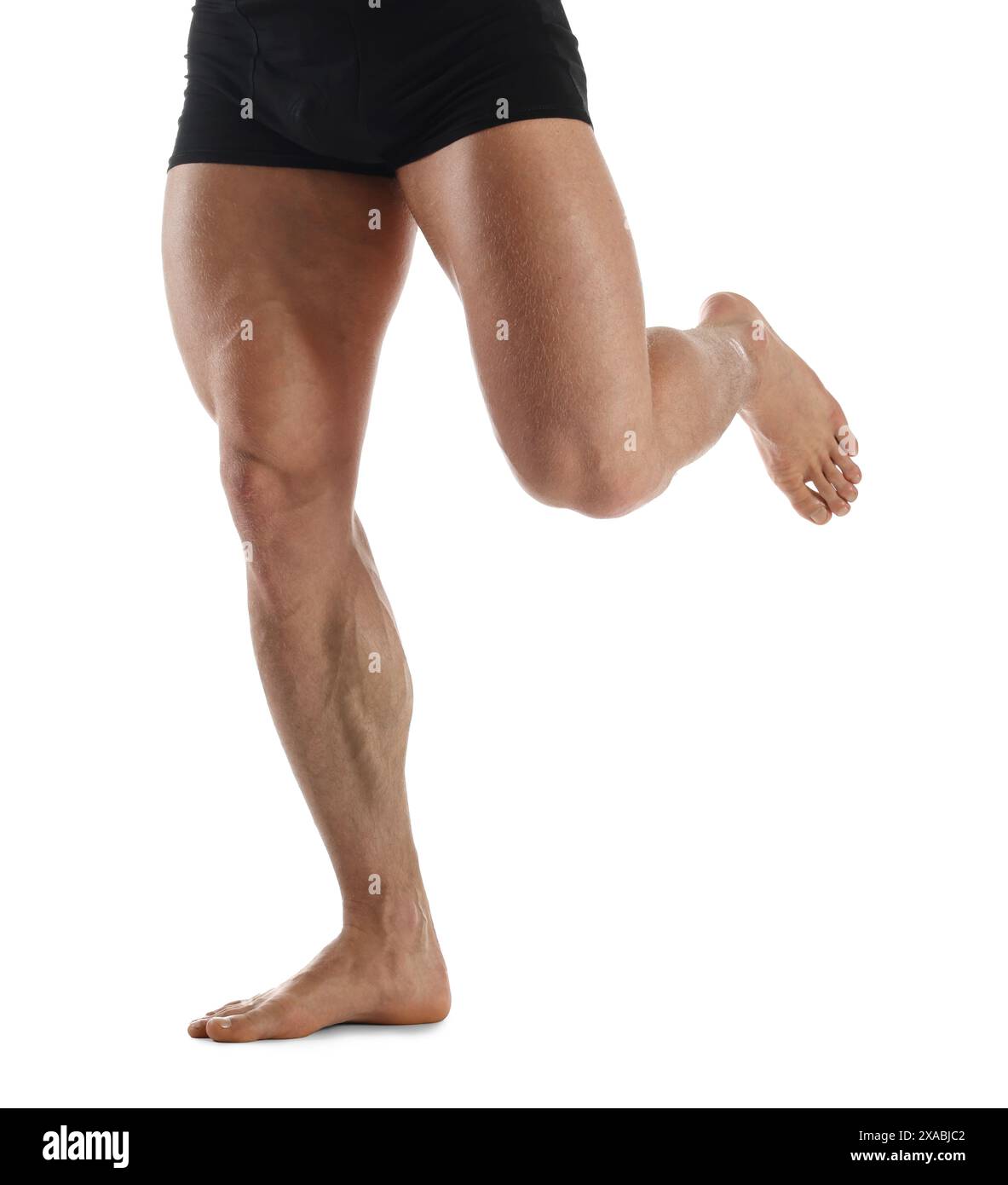 Man with muscular legs on white background, closeup Stock Photo - Alamy