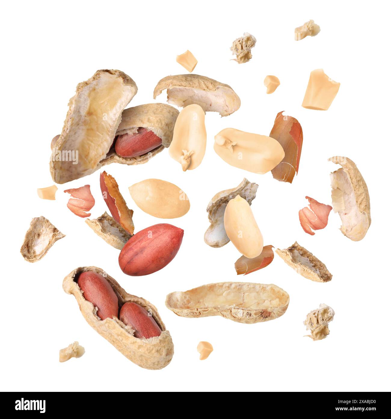 Peanuts and crushed pods in air on white background Stock Photo - Alamy