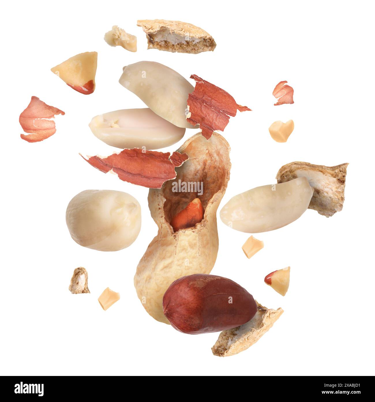 Peanuts and crushed pod in air on white background Stock Photo - Alamy