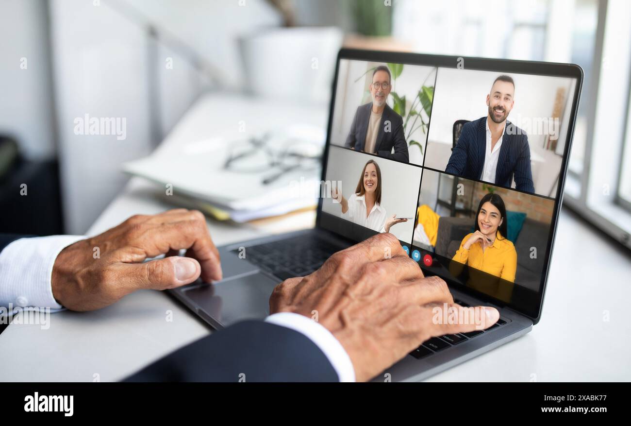 Business Colleagues Engaging in Virtual Meeting During Morning Work ...