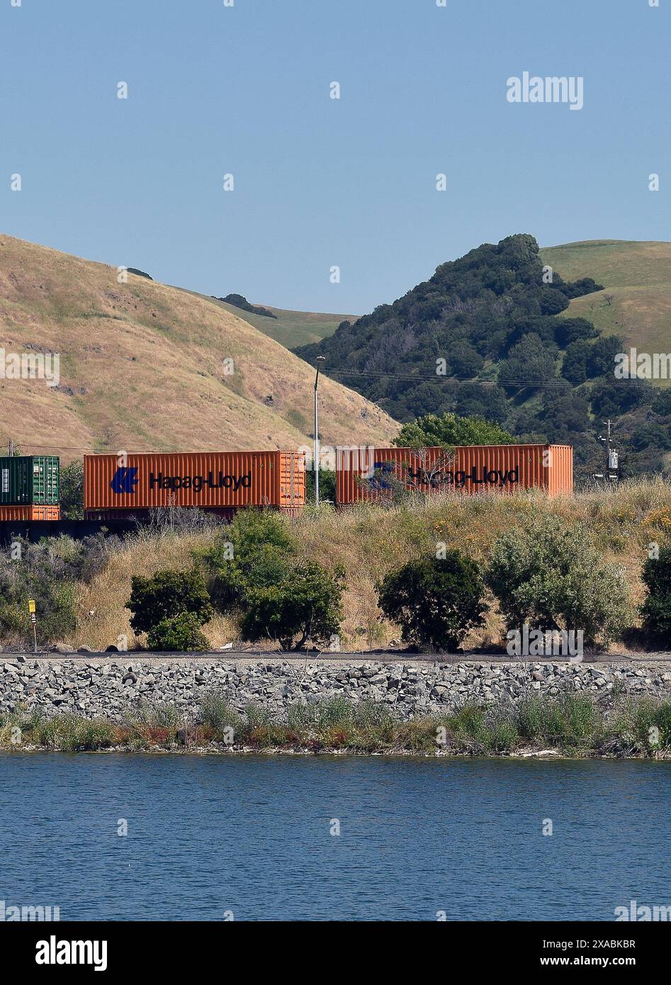 freight train Hapag-Lloyd container cars next to the Alameda Creek in ...