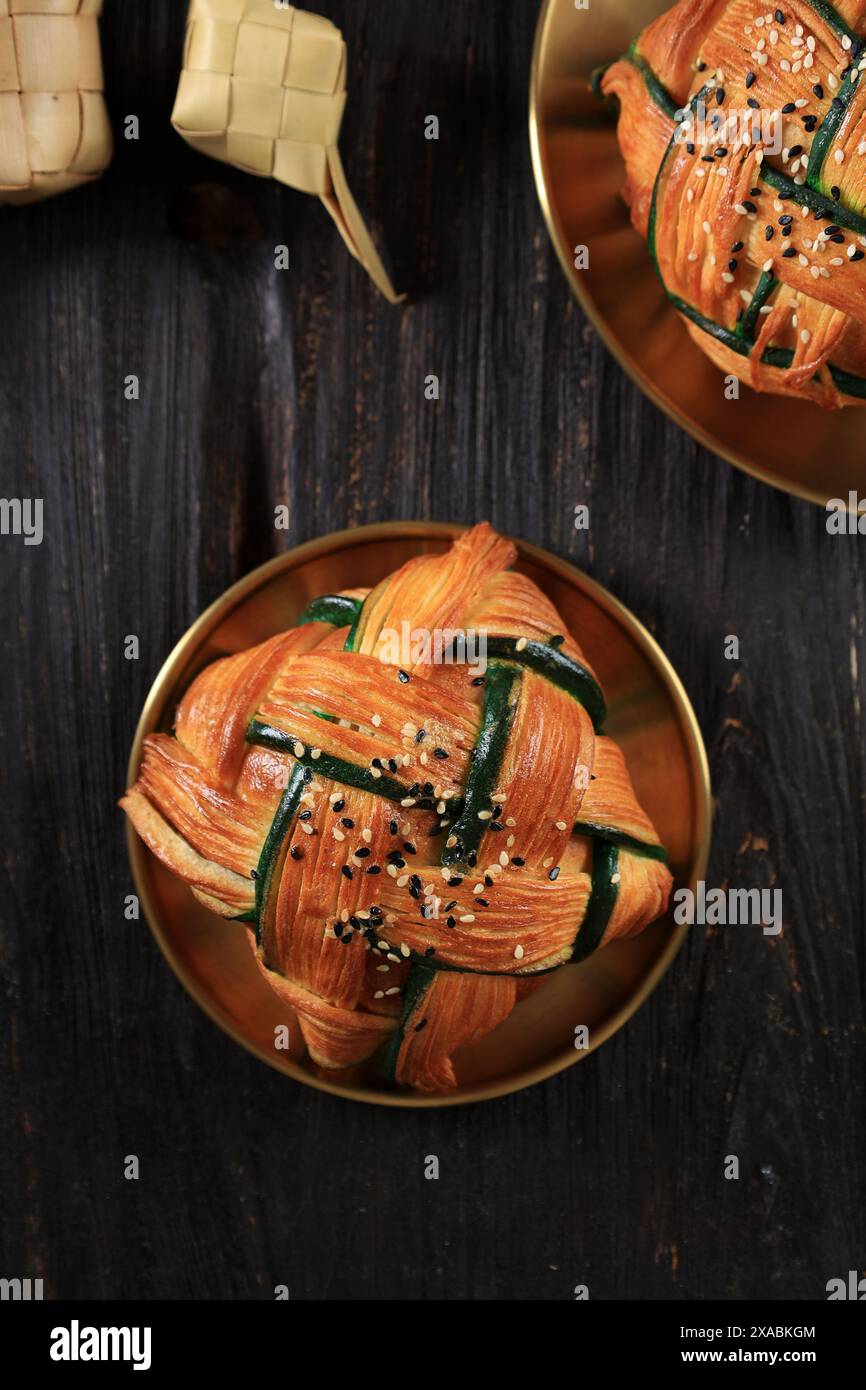 Top View Cropat Croissant Ketupat, Pastry with Beef Rendang Filling for ...
