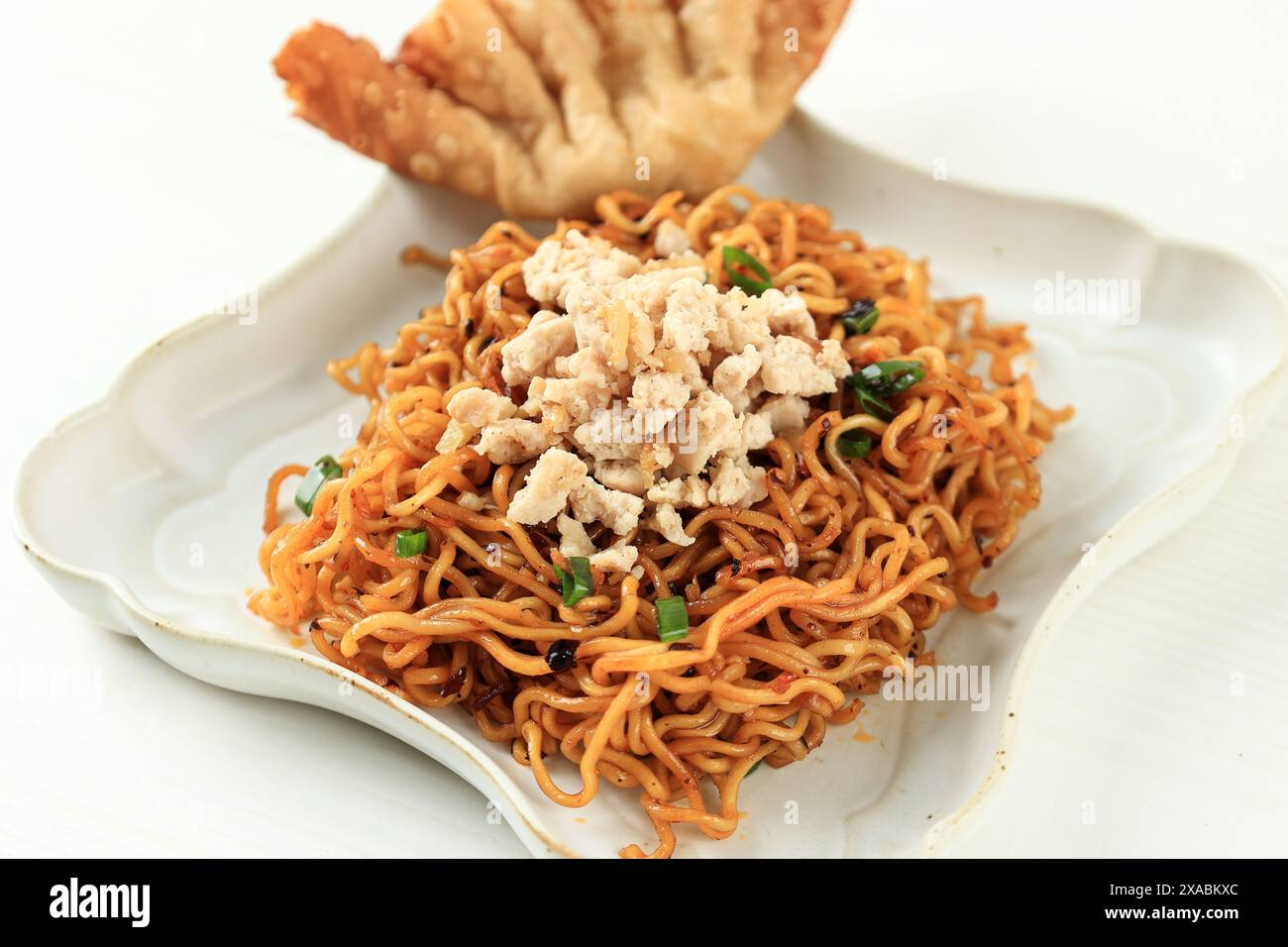 Mie Goreng ala Mie Gacoan with Crispy Fried Dumpling Stock Photo - Alamy