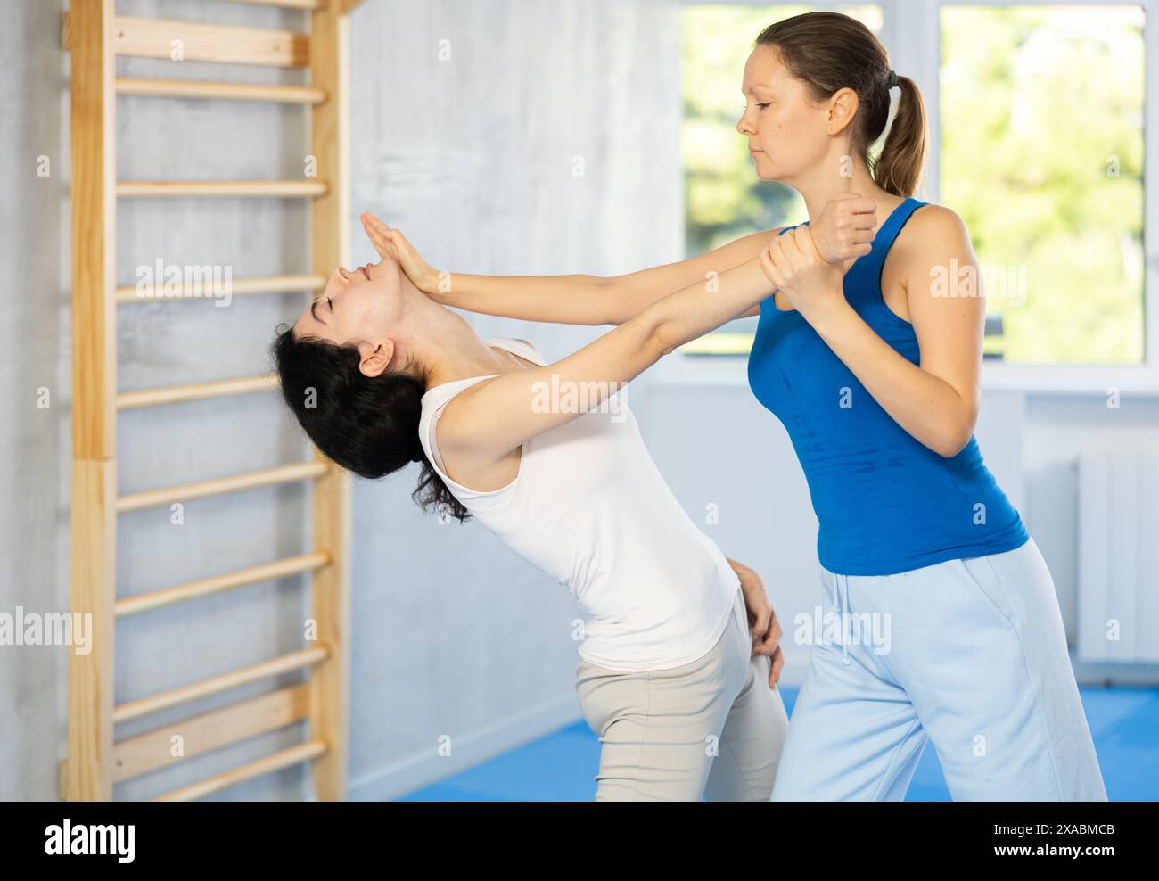 women trained in executing powerful palm punch Stock Photo - Alamy