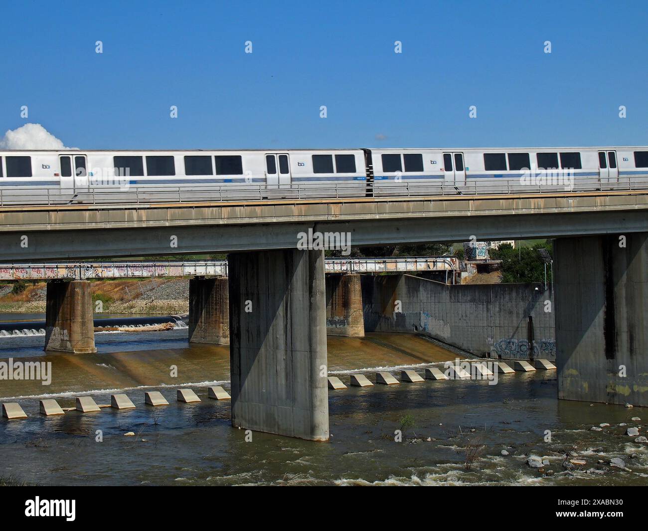 BART train crosses over the Alameda Creek, California Stock Photo - Alamy