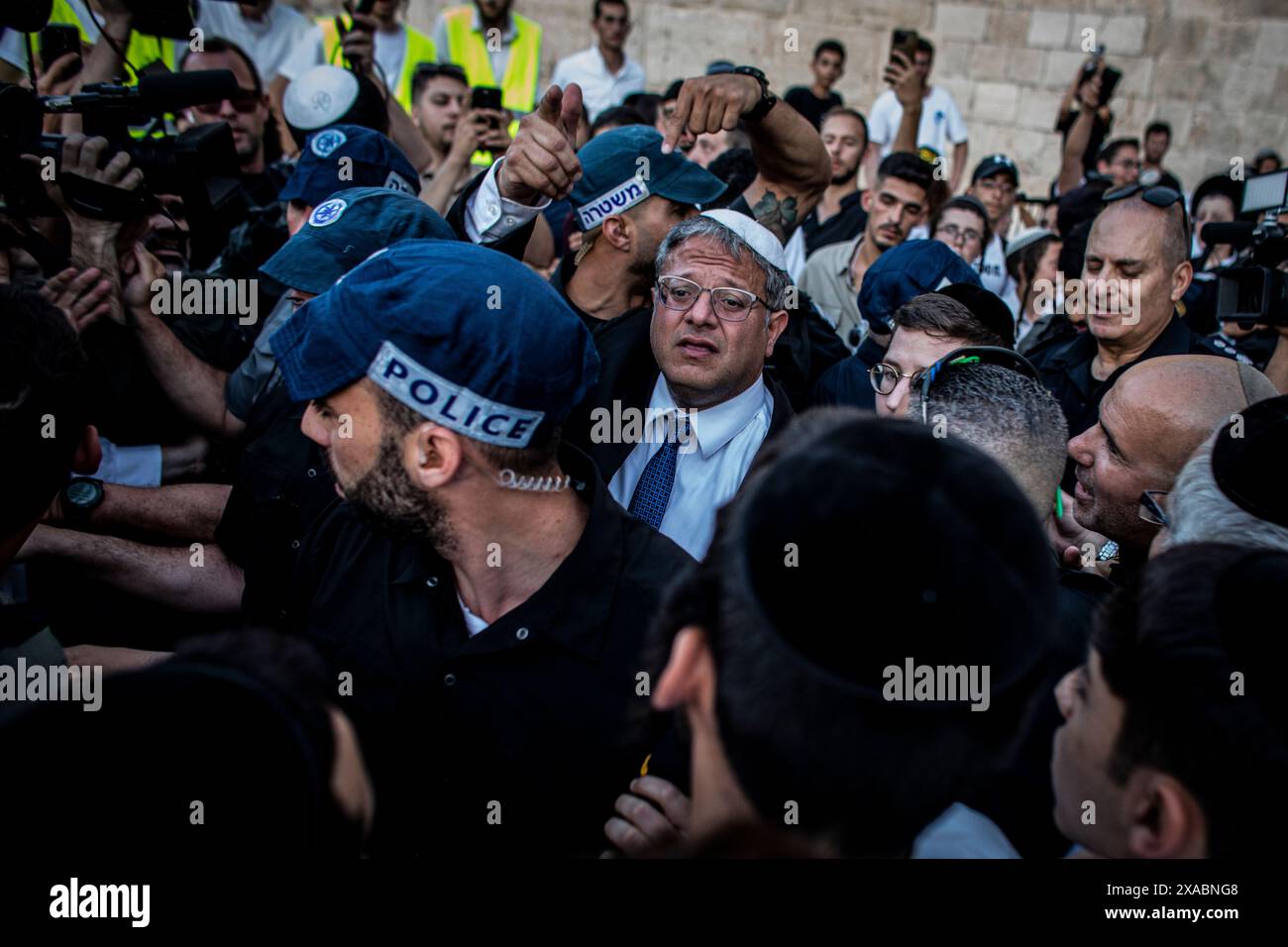 Israeli Minister of National Security, Itamar Ben Gvir, surrounded by Security officers stands ...