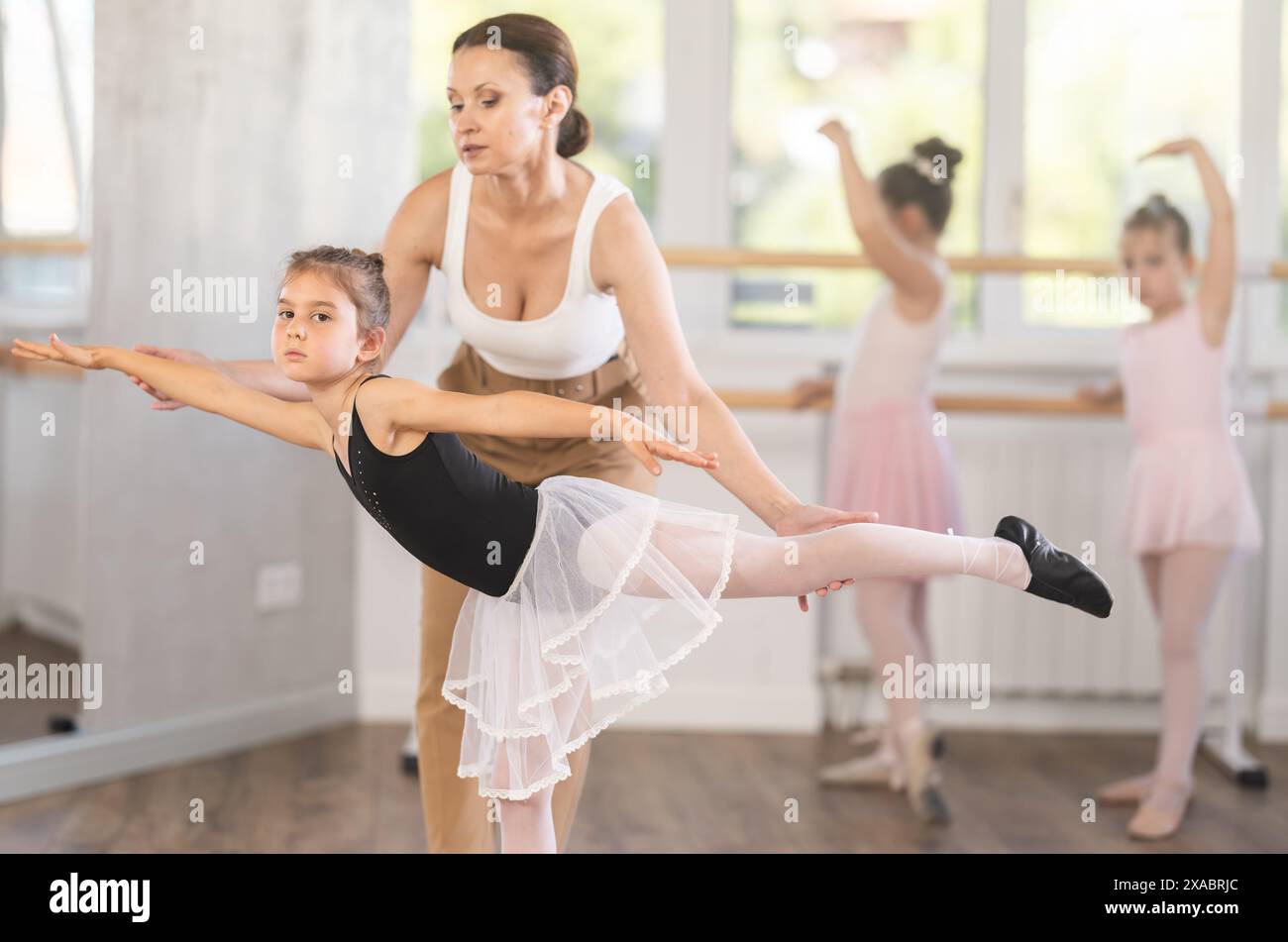 Ballet lesson for little girls - choreography teacher shows little ...