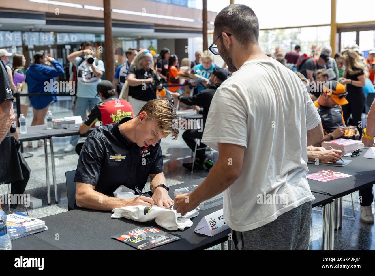 June 1st, 2024: A.J Foyt Enterprises driver Sting Ray Robb (41) signs ...