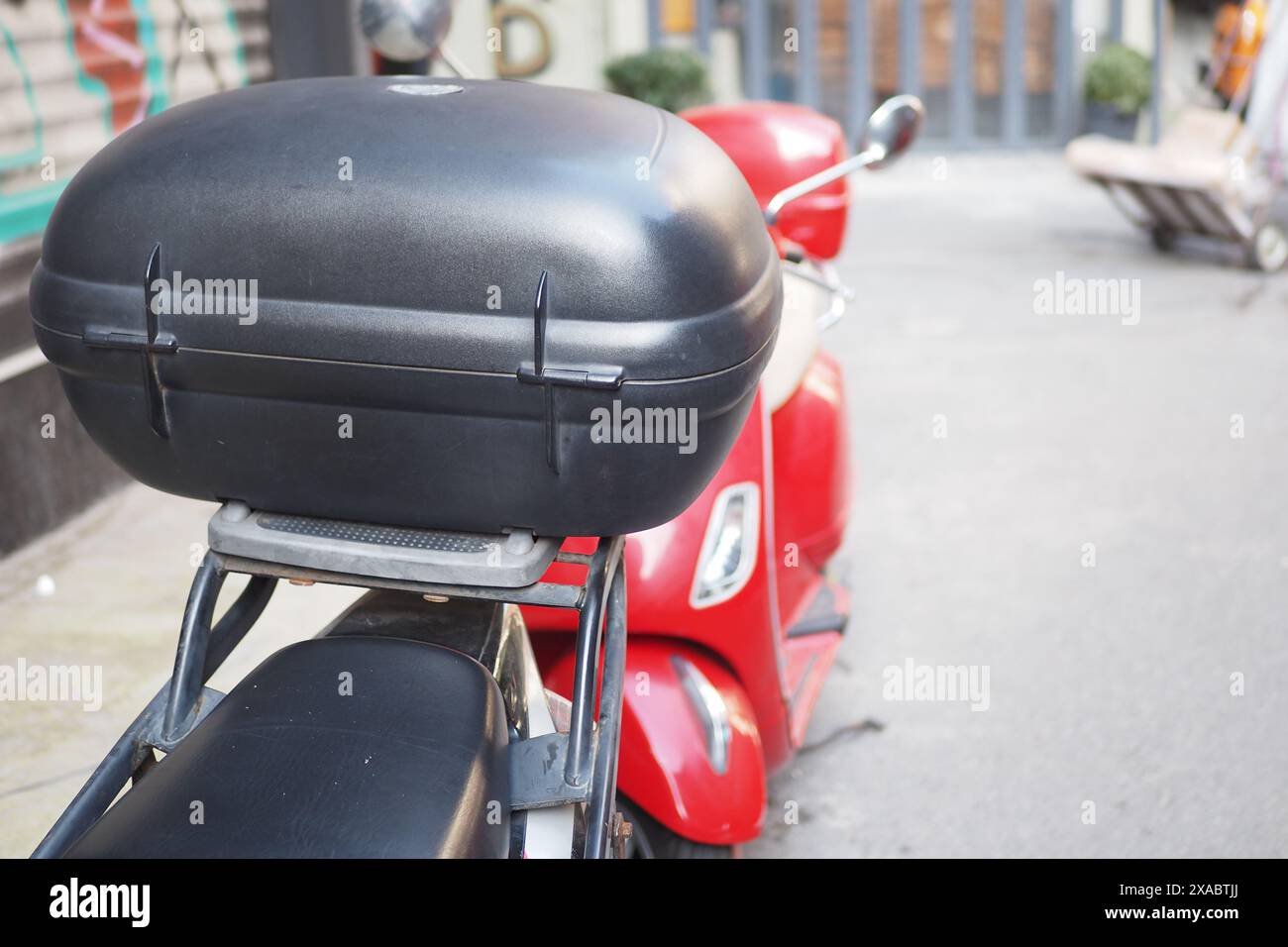 Storage red box on back of motorcycle Stock Photo - Alamy