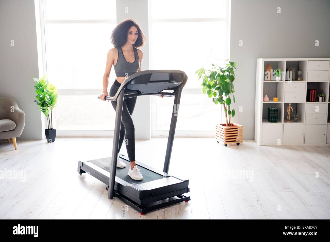 Photo of nice adorable active girl going running physical exercises in ...
