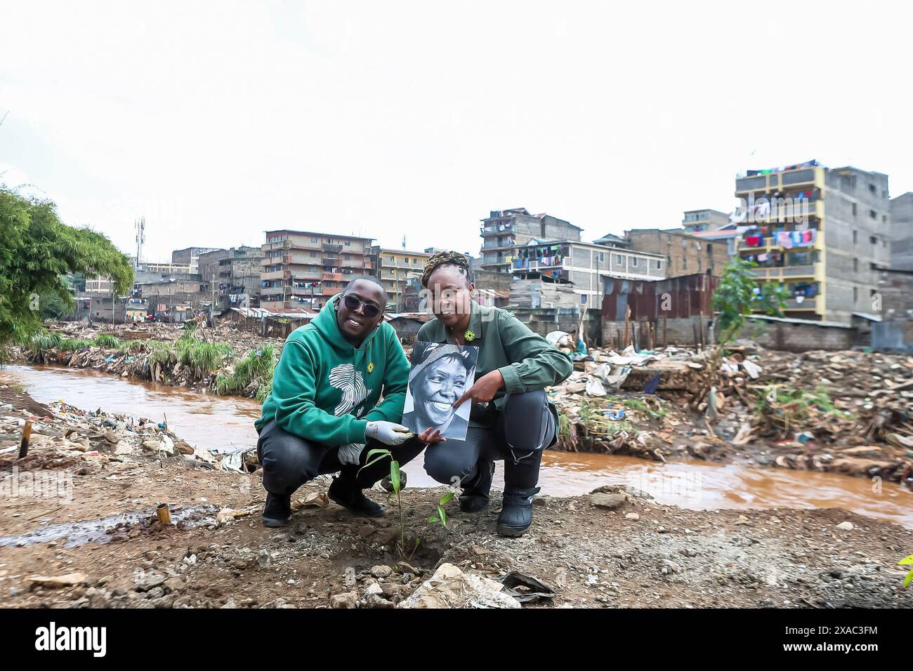 Nyaguthii Chege and Job Mwangi of the Green Belt Movement hold a ...