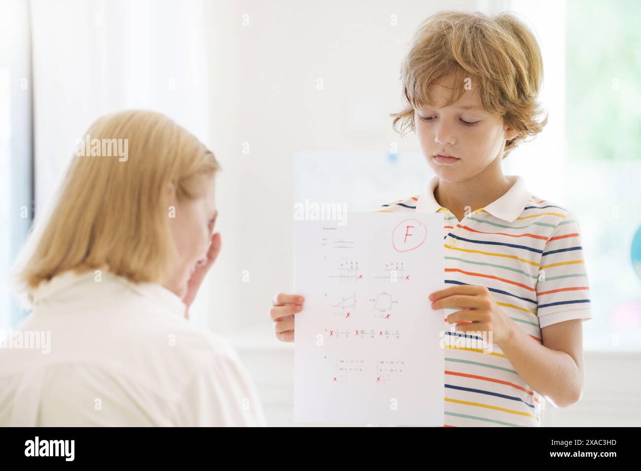 School boy crying classroom hi-res stock photography and images - Alamy