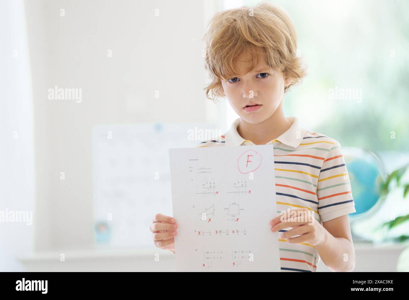 School boy crying classroom hi-res stock photography and images - Alamy