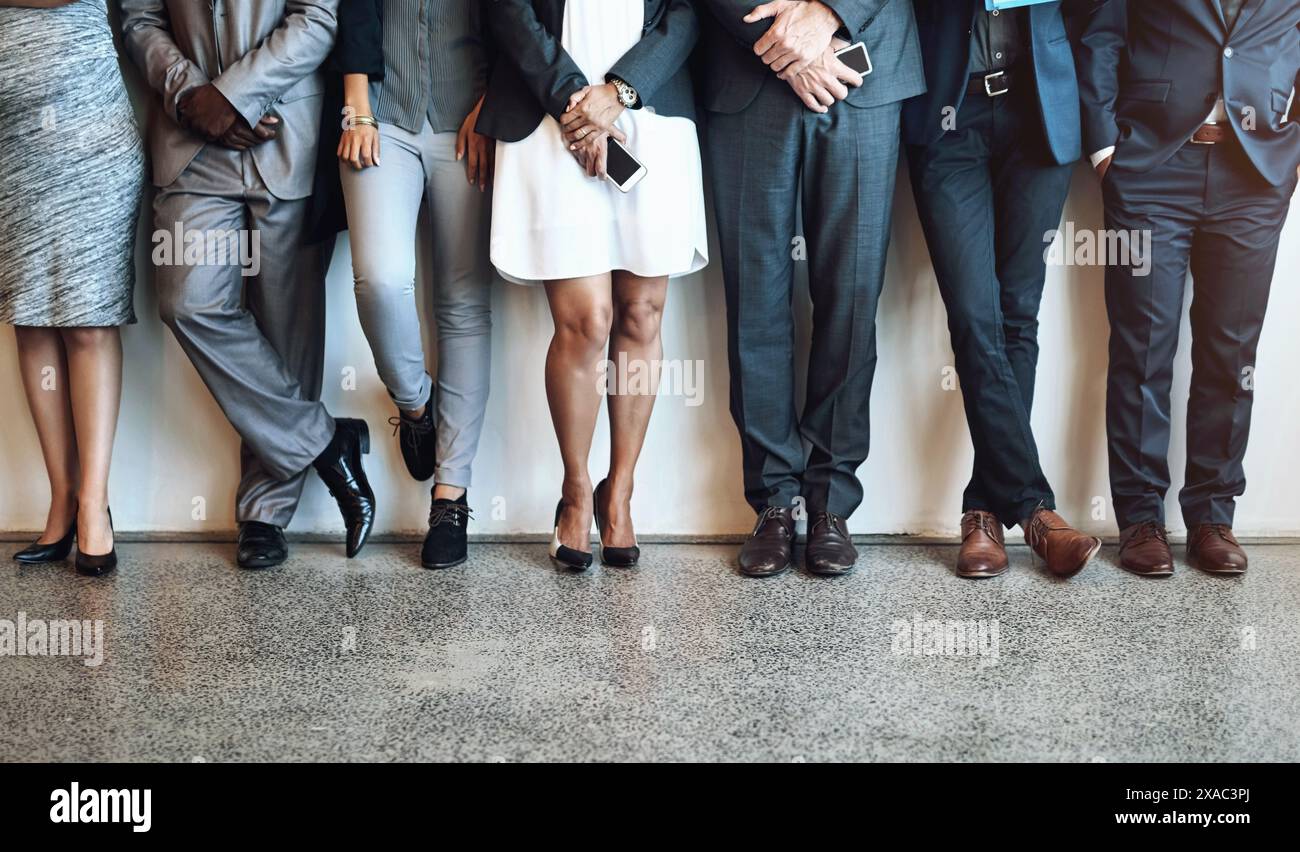 Interview, feet and business people in waiting room for human resources ...