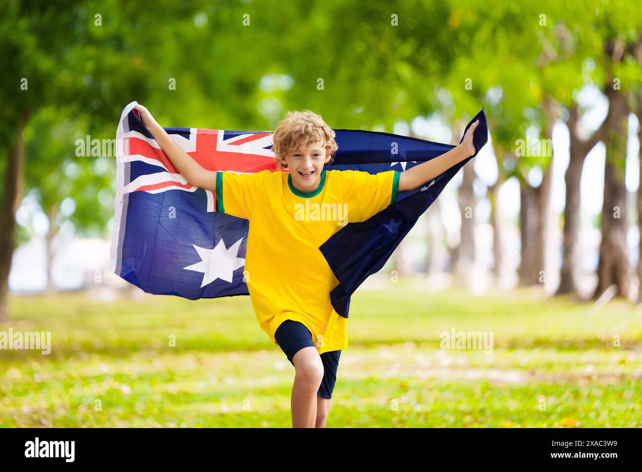 Australia team fans with flag. Australian supporter child. Kid cheering ...