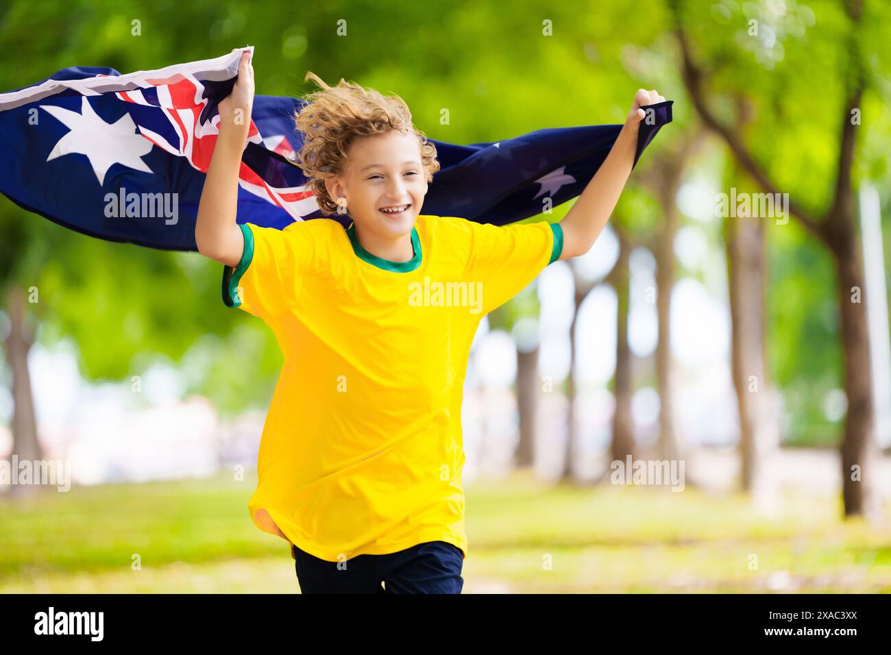 Australia team fans with flag. Australian supporter child. Kid cheering ...