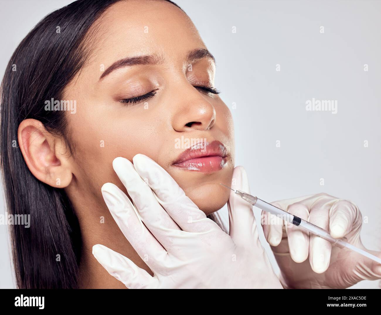 Lip injection procedure plastic surgery hi-res stock photography and ...