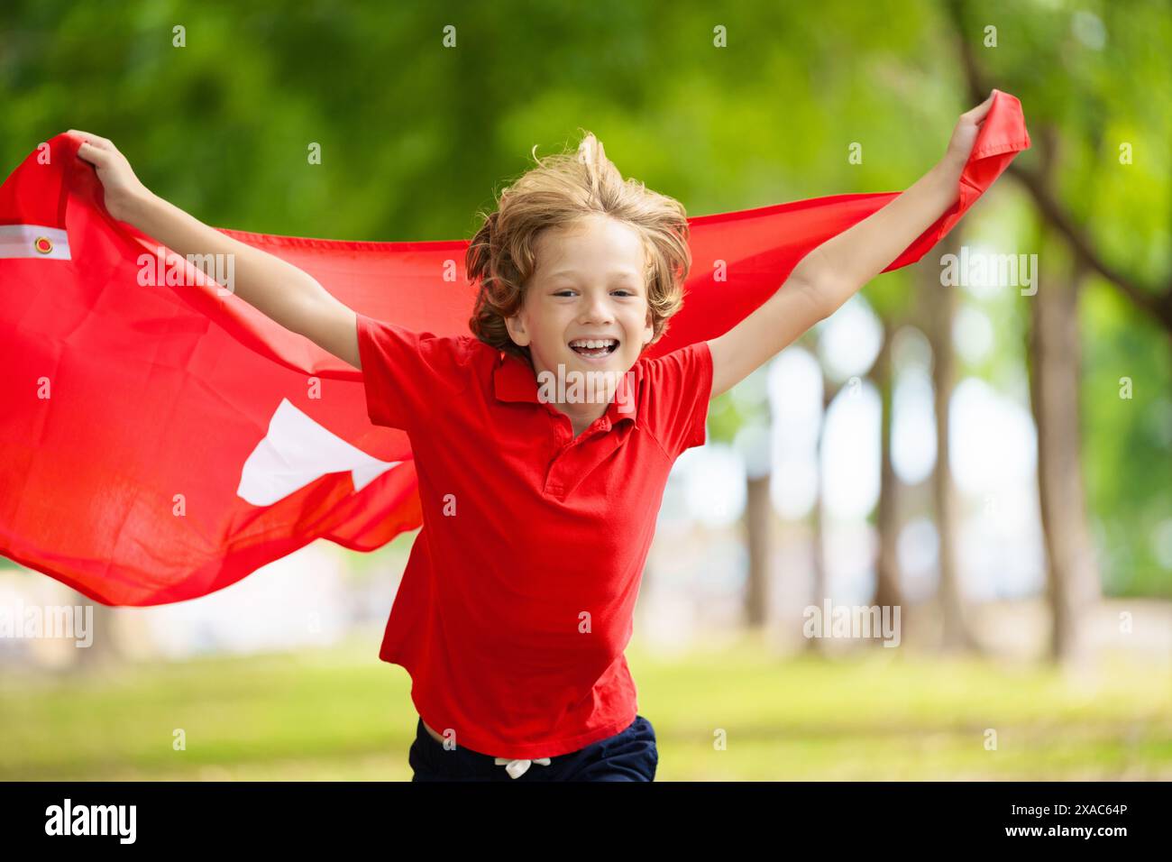 Child running with Switzerland flag. Little Swiss kid celebrating ...