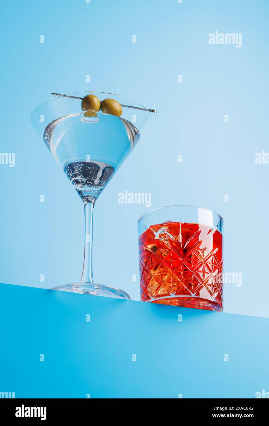 Cocktail delight: Vibrant drinks against a cool blue background with ...