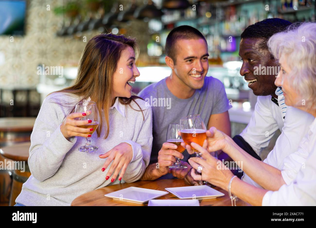 View on the young Latin couple talking Stock Photo - Alamy