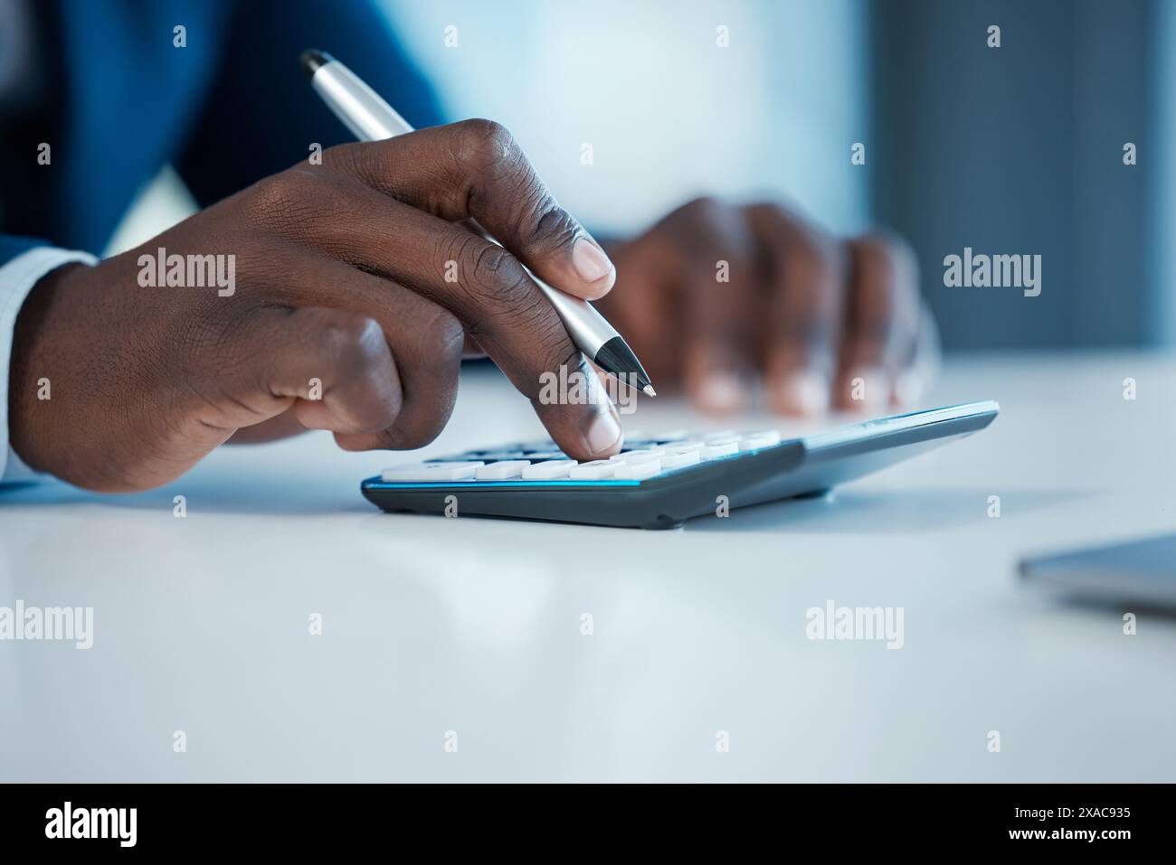 Corporate, black man and hand with calculator on desk for planning ...